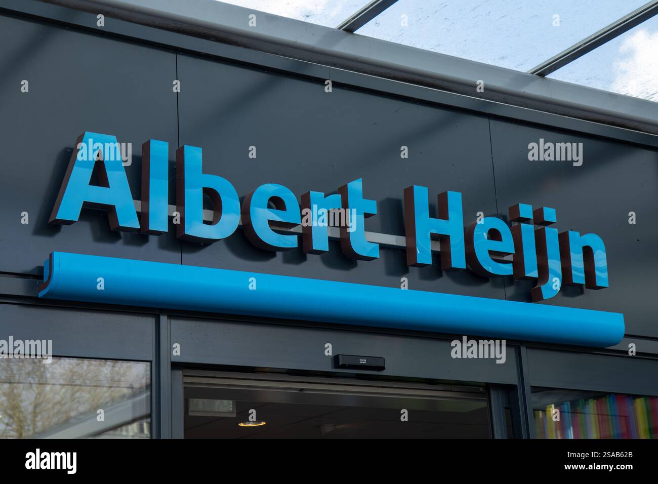 Albert Heijn supermarket flag sign logo, the largest supermarket chain in the Netherlands Stock ...