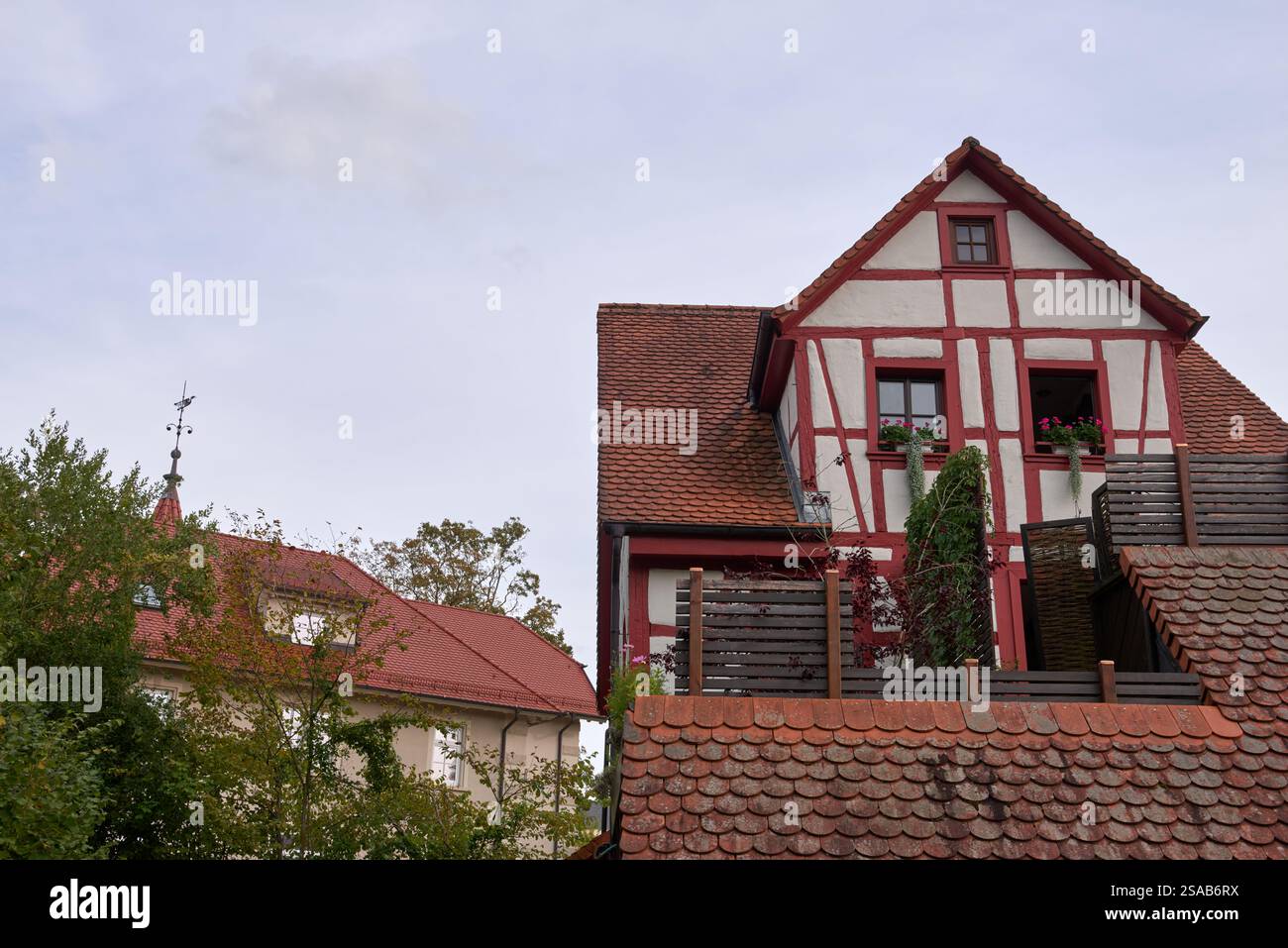 Traditional German half timbered house with red wooden beams and clay ...
