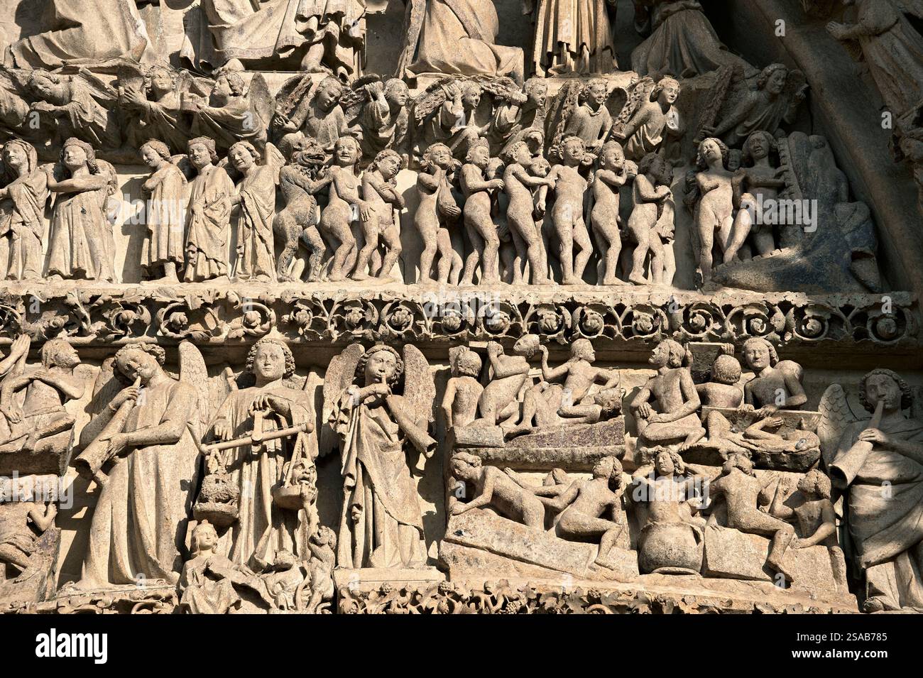 Gothic sculpture above the door of medieval Amiens Cathedral, Amiens ...