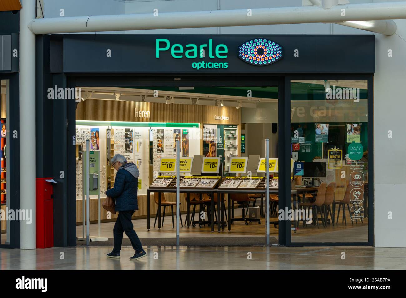 Pearle Opticien shop, illuminated sign above the store entrance Stock ...