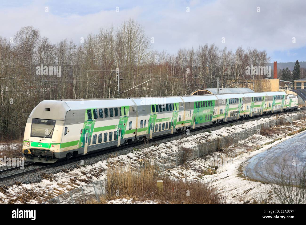 VR Group Intercity electric two storey passenger train travelling ...