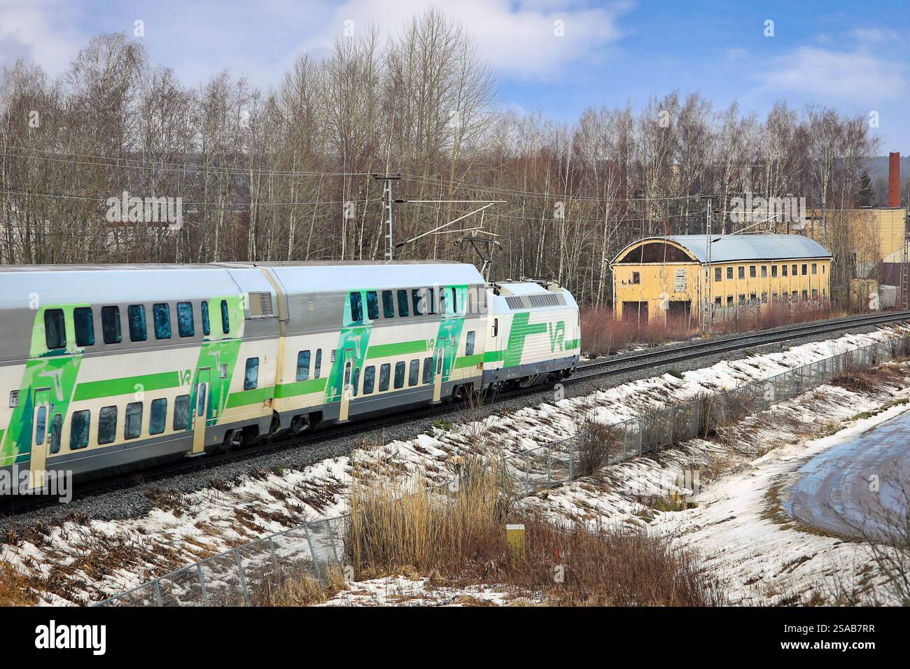 VR Group Intercity electric two storey passenger train travelling ...