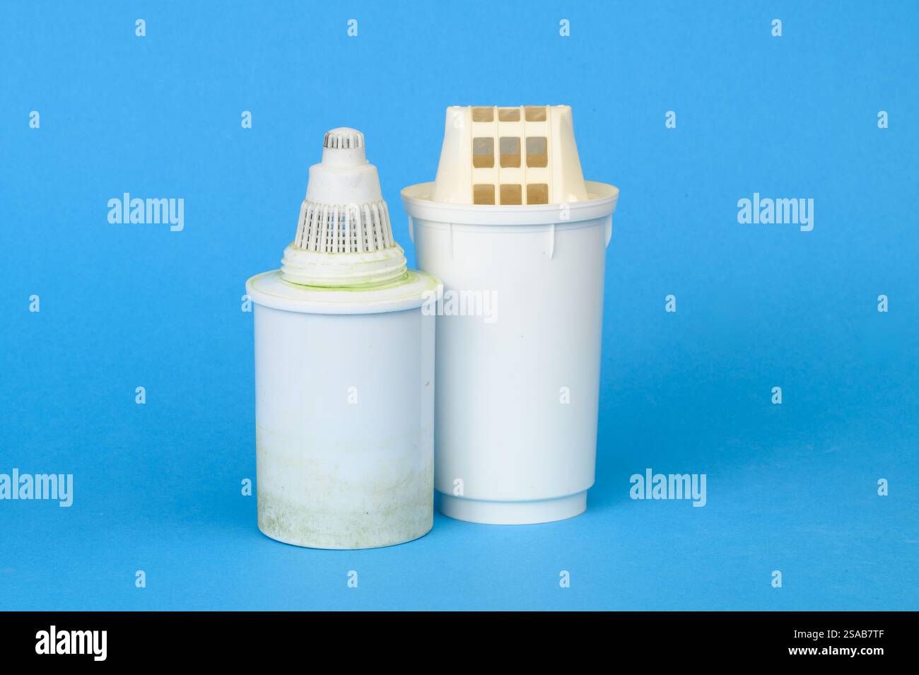 Two old used dirty water filters. Water filtration system in house to ...