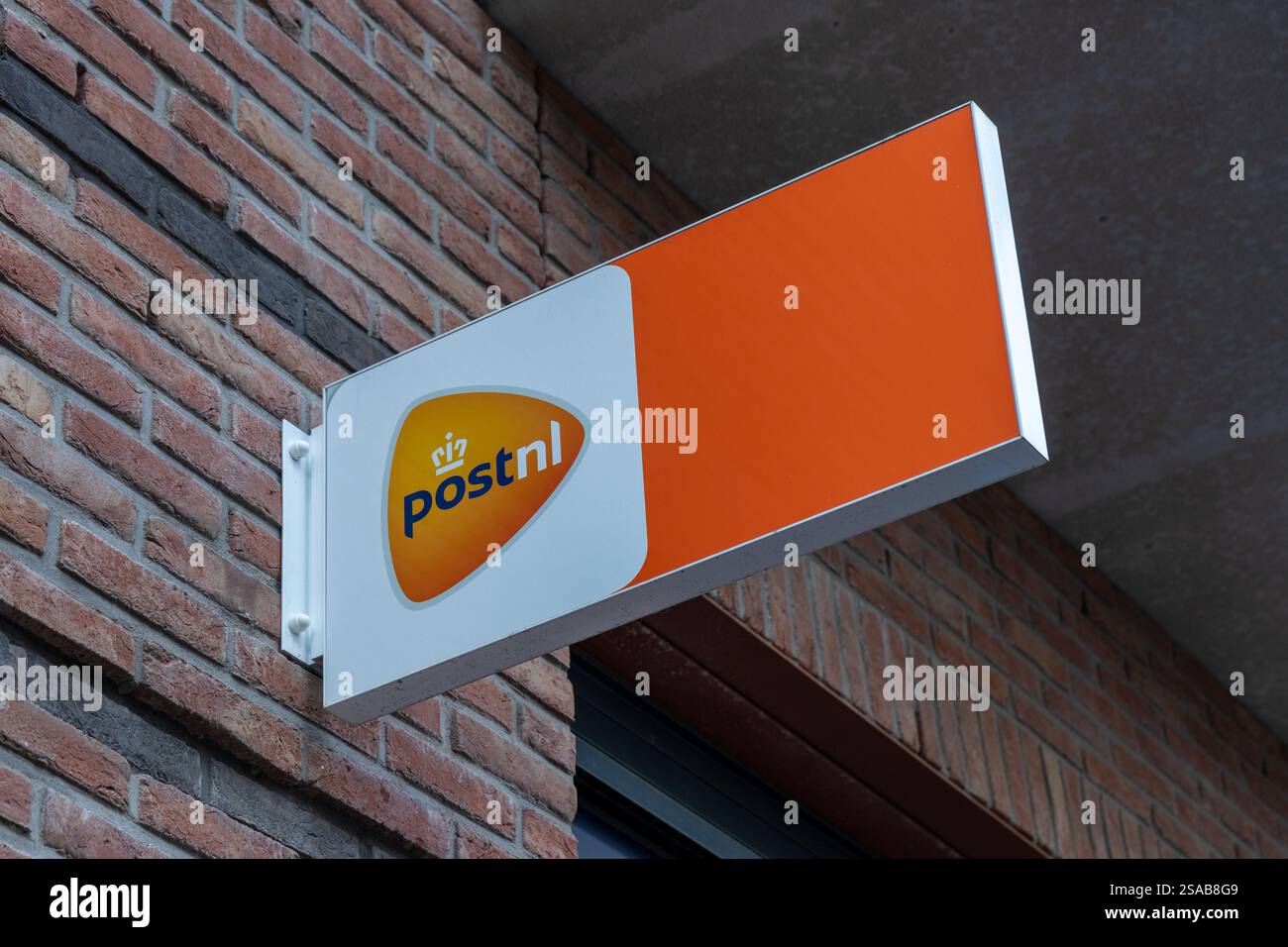 Postnl Flag sign logo at pakket punt. The national and biggest postal ...