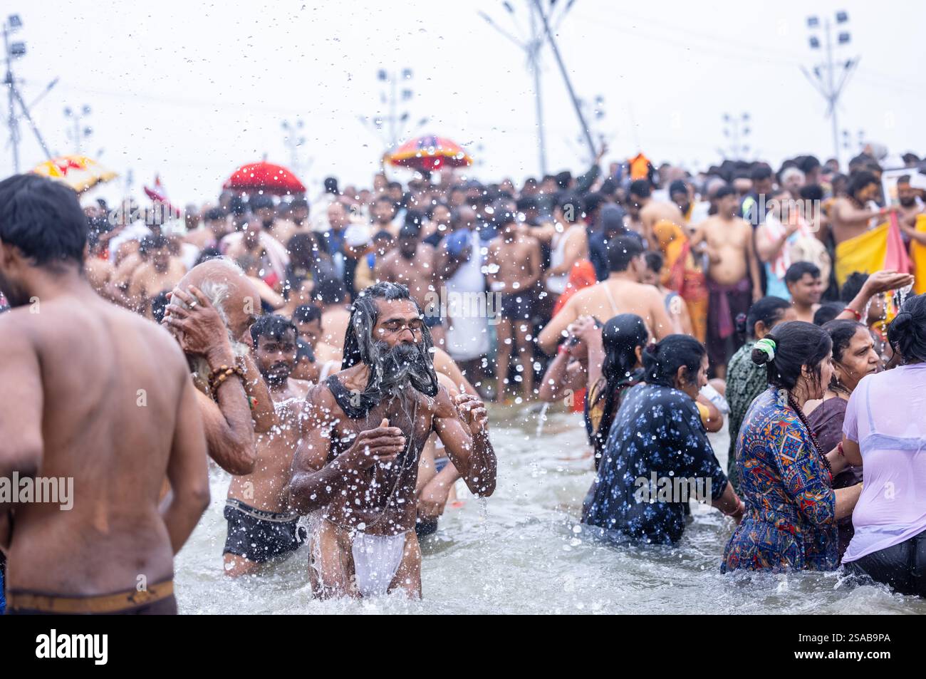 Mahakumbh, Group of holy naga sadhu baba taking holy dip at sangam in ...