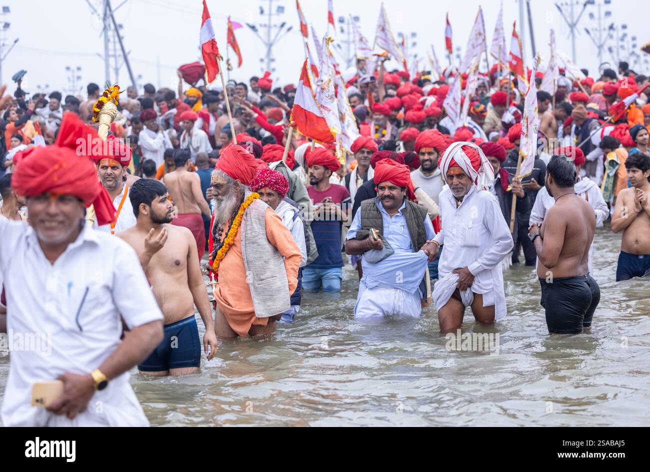 Mahakumbh, Group of holy naga sadhu baba taking holy dip at sangam in ...