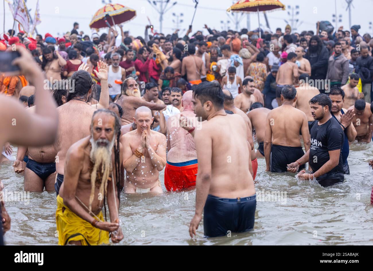 Mahakumbh, Group of holy naga sadhu baba taking holy dip at sangam in ...