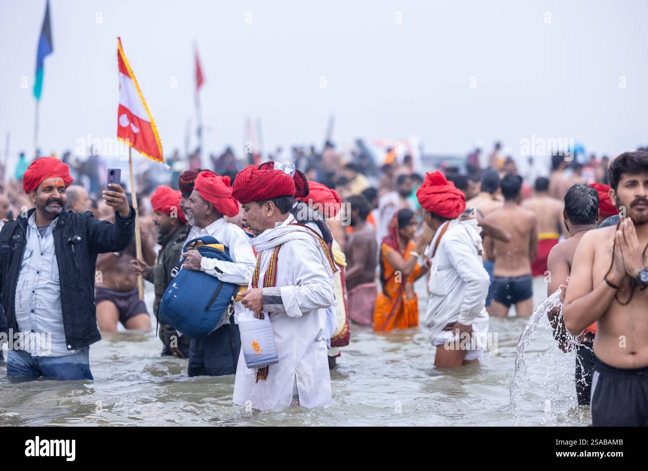 Mahakumbh, Group of holy naga sadhu baba taking holy dip at sangam in ...