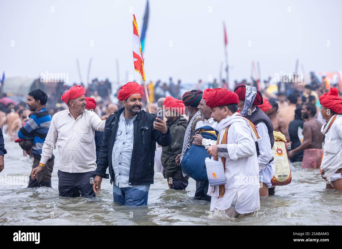 Mahakumbh, Group of holy naga sadhu baba taking holy dip at sangam in ...