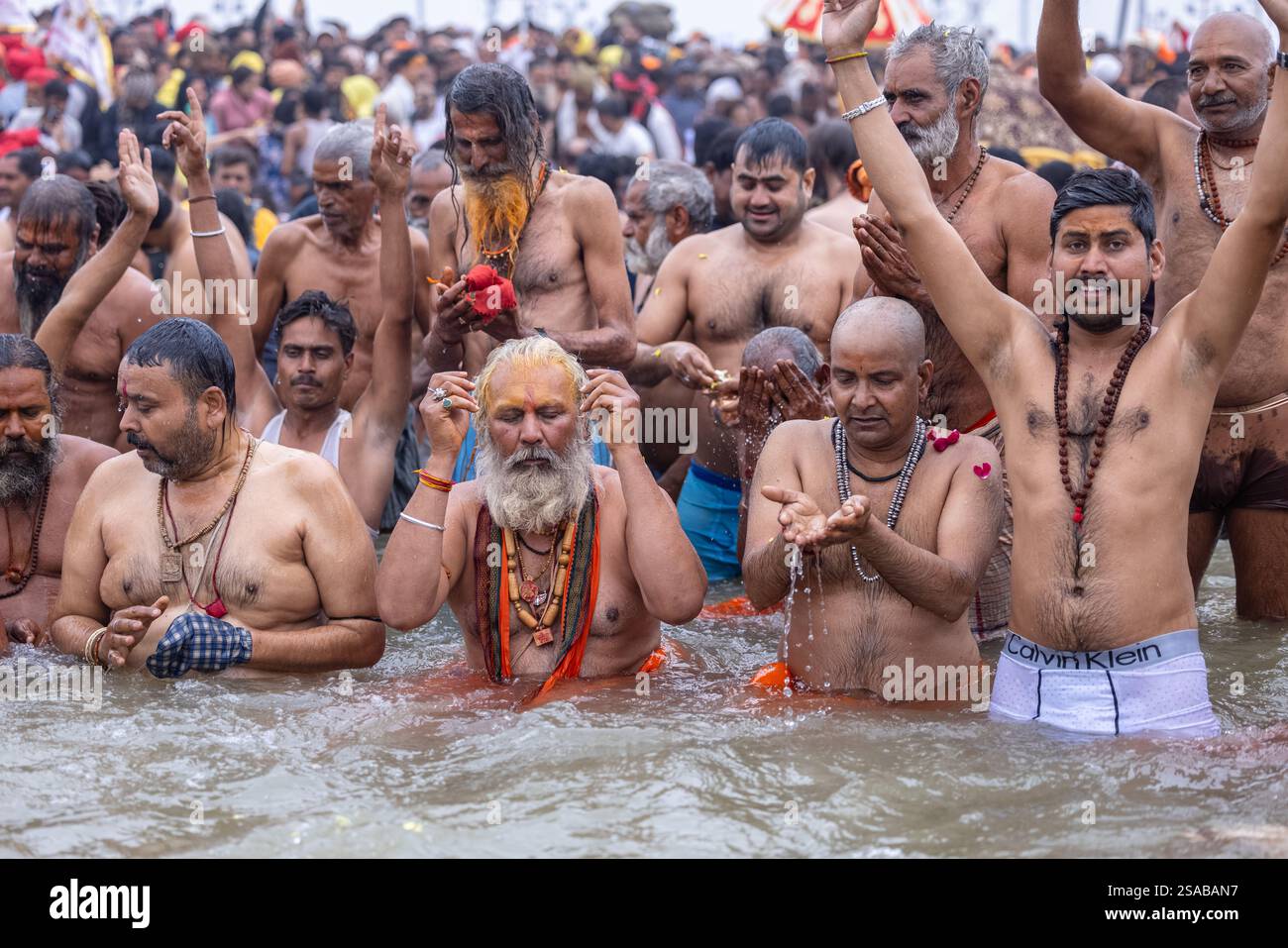 Mahakumbh, Group of holy naga sadhu baba taking holy dip at sangam in ...