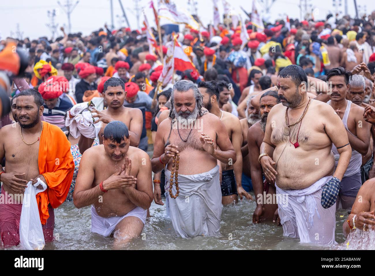 Mahakumbh, Group of holy naga sadhu baba taking holy dip at sangam in river ganga during the ...