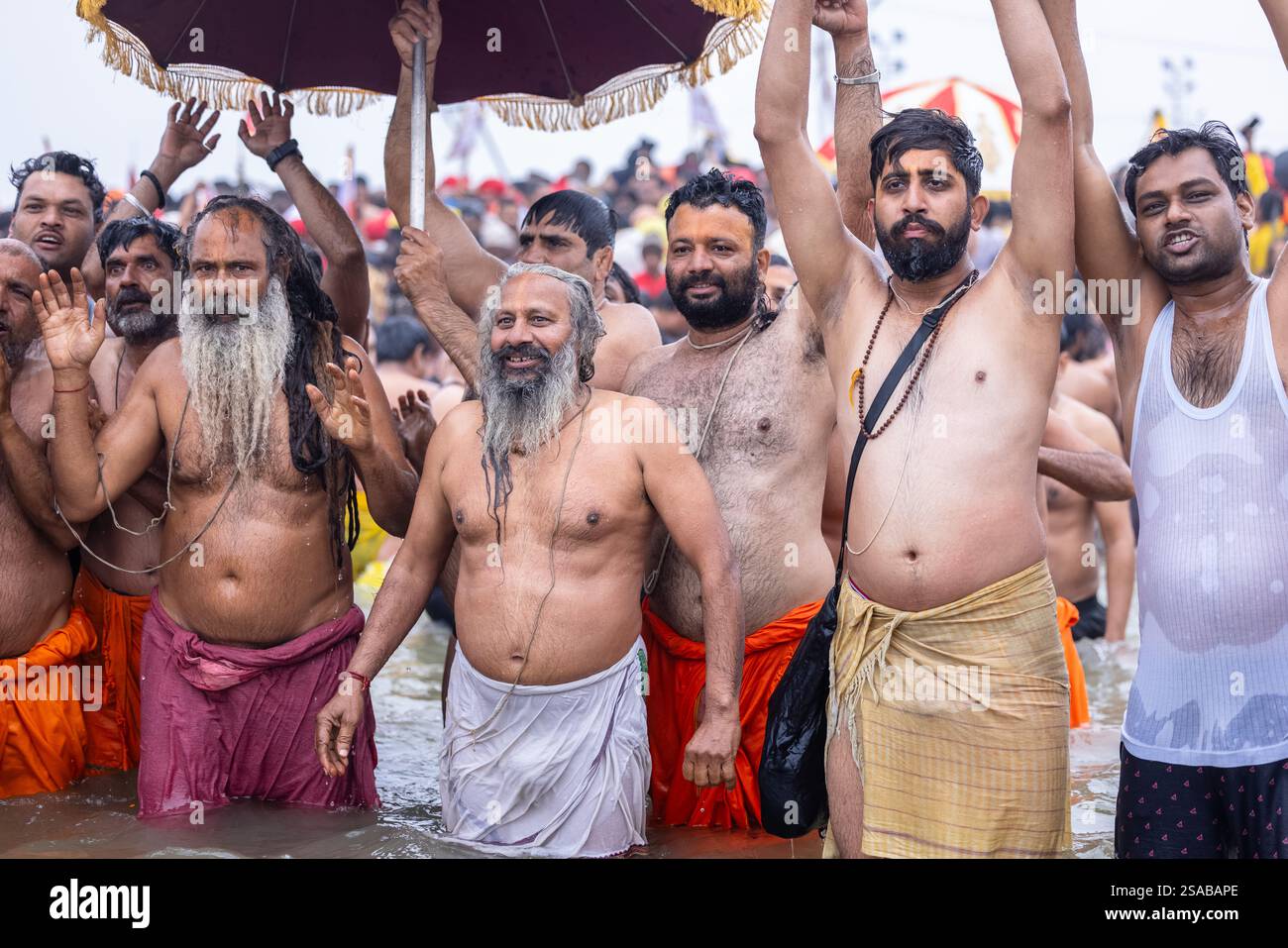 Mahakumbh, Group of holy naga sadhu baba taking holy dip at sangam in ...