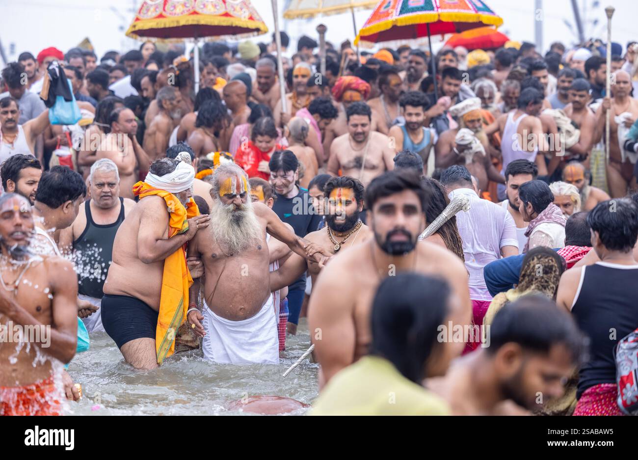 Mahakumbh, Group of holy naga sadhu baba taking holy dip at sangam in ...