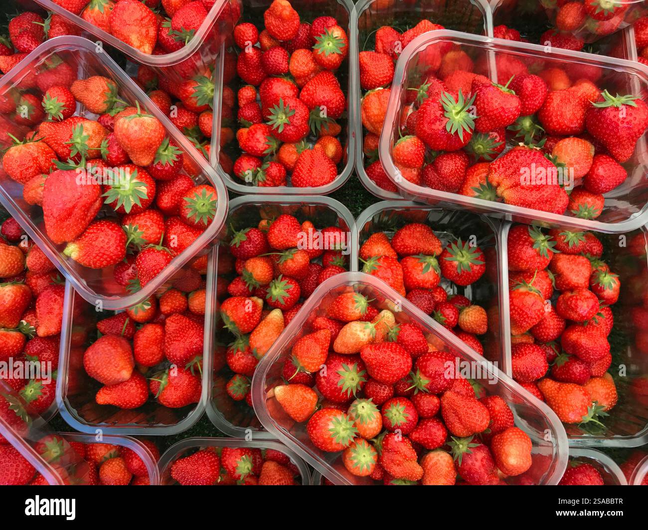 Pile of fresh organic strawberries for sale on a market stall Stock ...