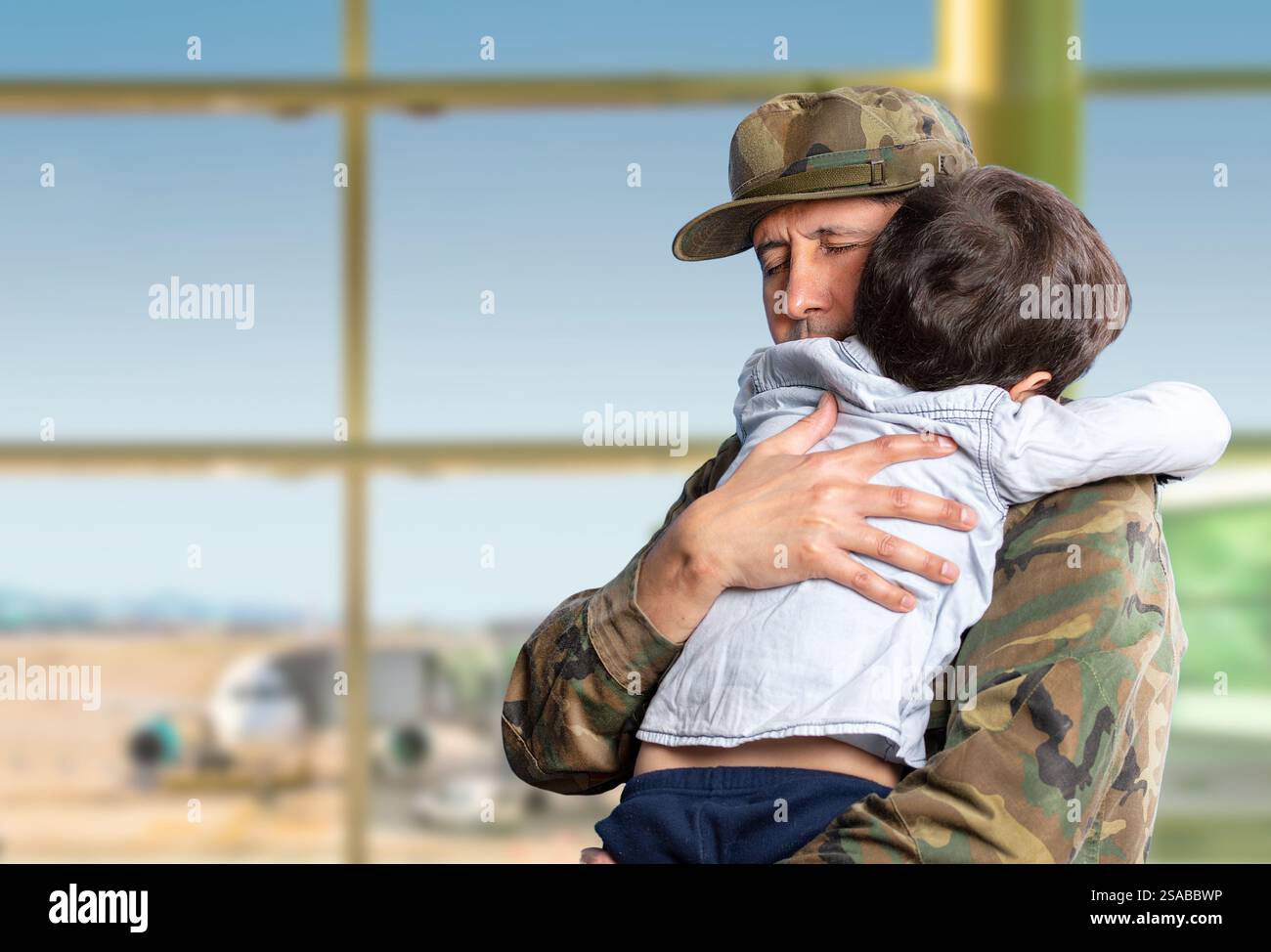 Military father hugs his son when they are reunited after a mission ...
