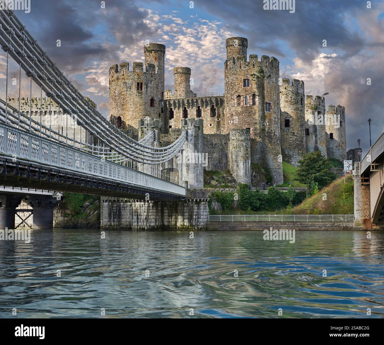 The exterior battlements and turrets of medieval Conwy Castle built ...