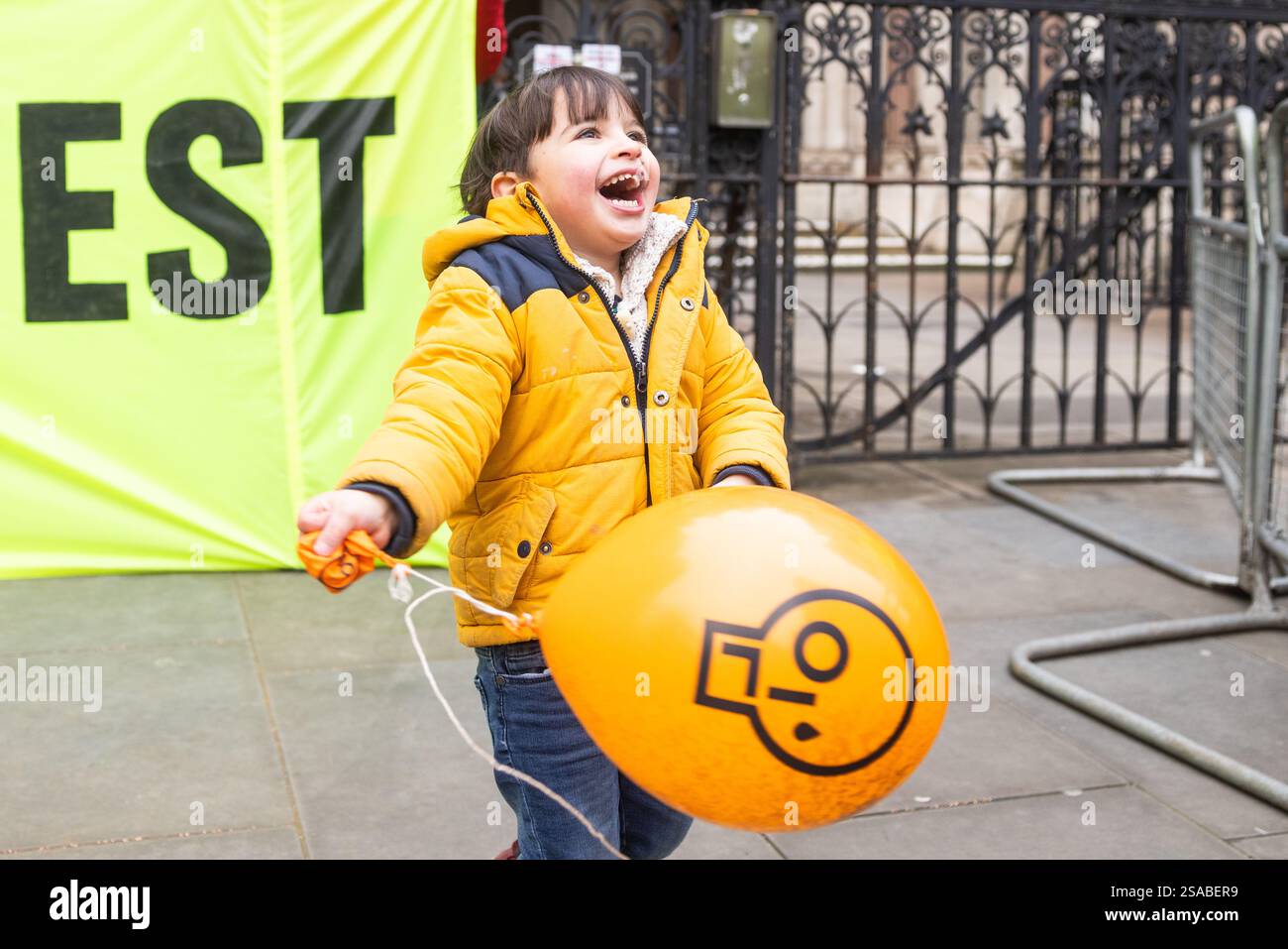 London, UK. 29 JAN, 2025. Young boy plays with Just Stop Oil Balloon ...