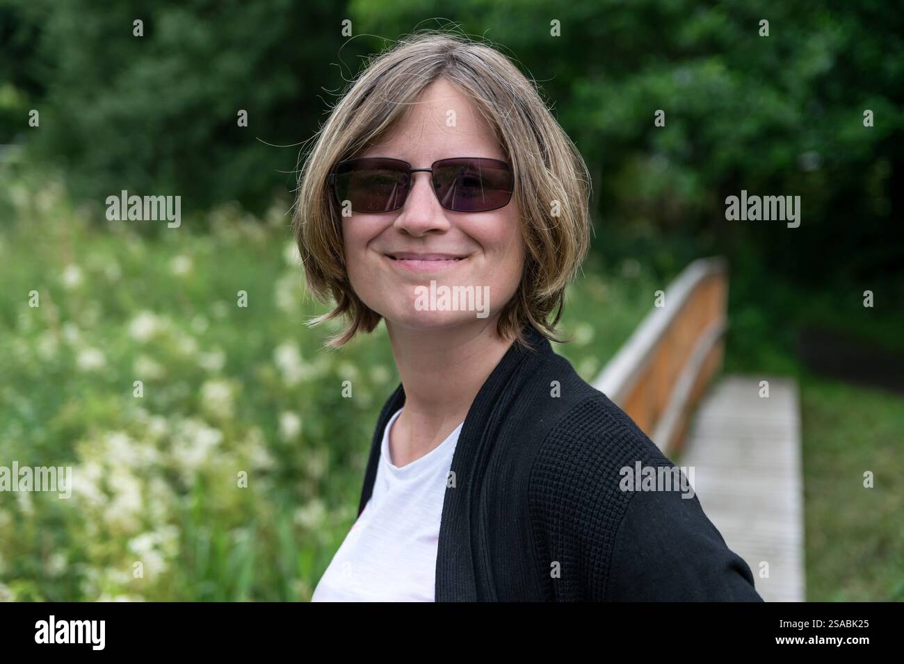 Outdoor portrait of a 31 yo white woman during a walk in nature ...