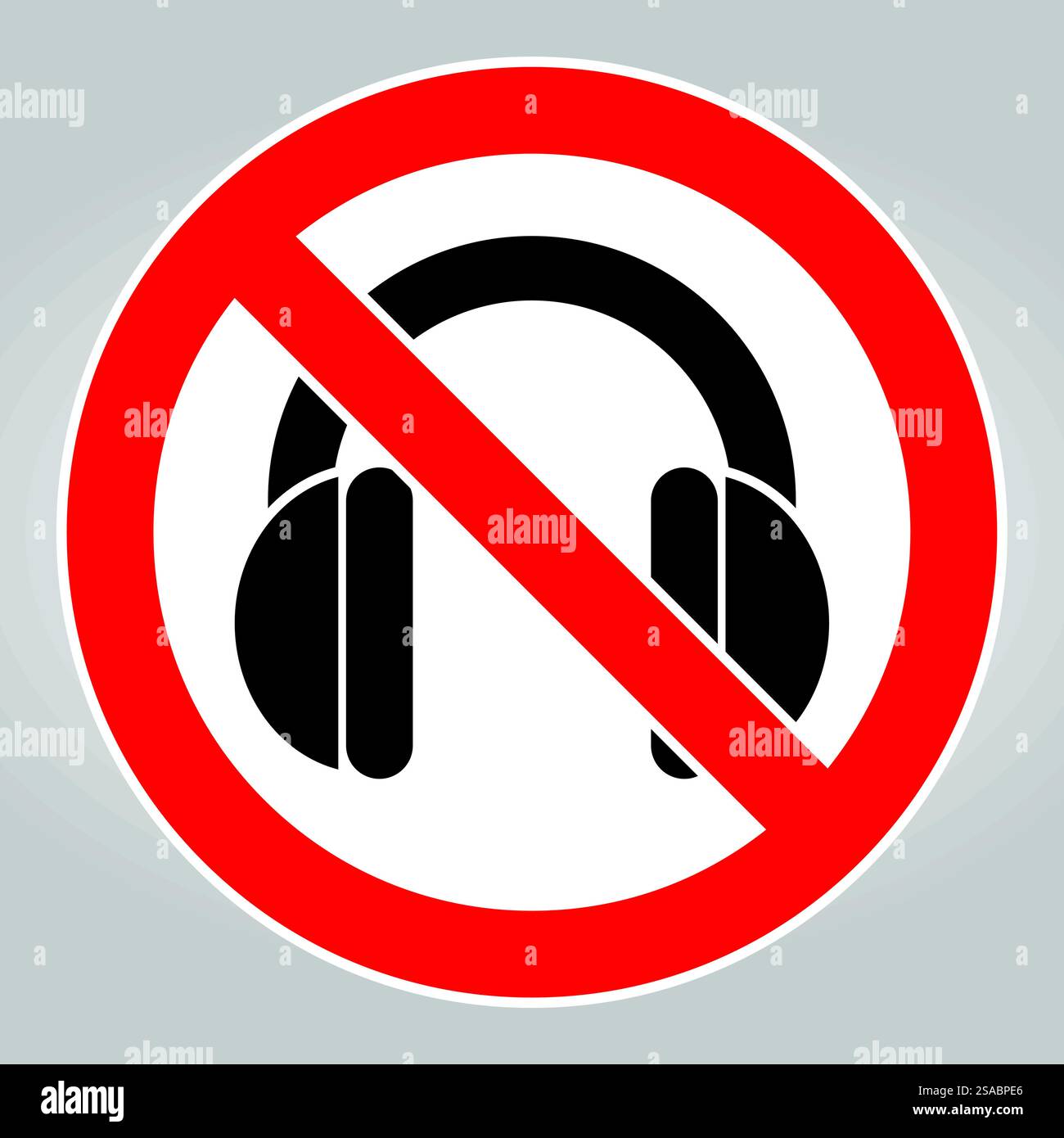 A clear warning sign depicting a prohibition symbol against headphones ...