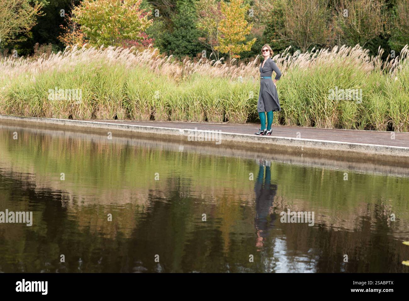 Outdoor portrait of a 31 yo woman in the Stuyvenberg Royal city park ...