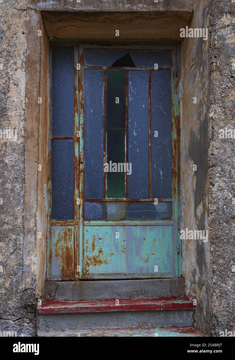 Weathered glass entrance door, mountain village of Lakkoi, Crete ...