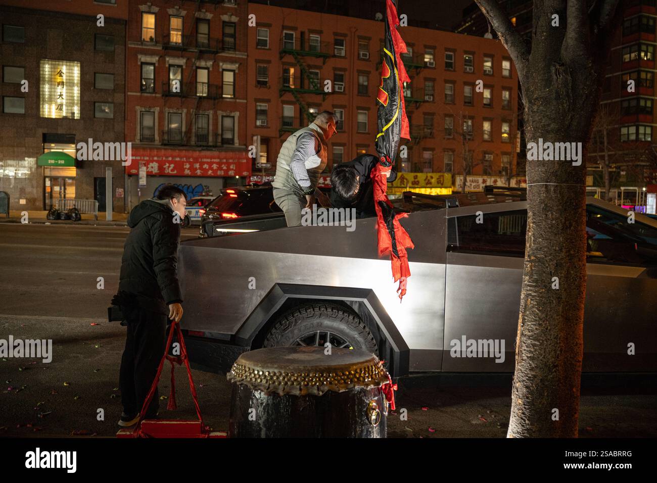 Members of the New York Chinese Freemasons Athletic Club load the ...