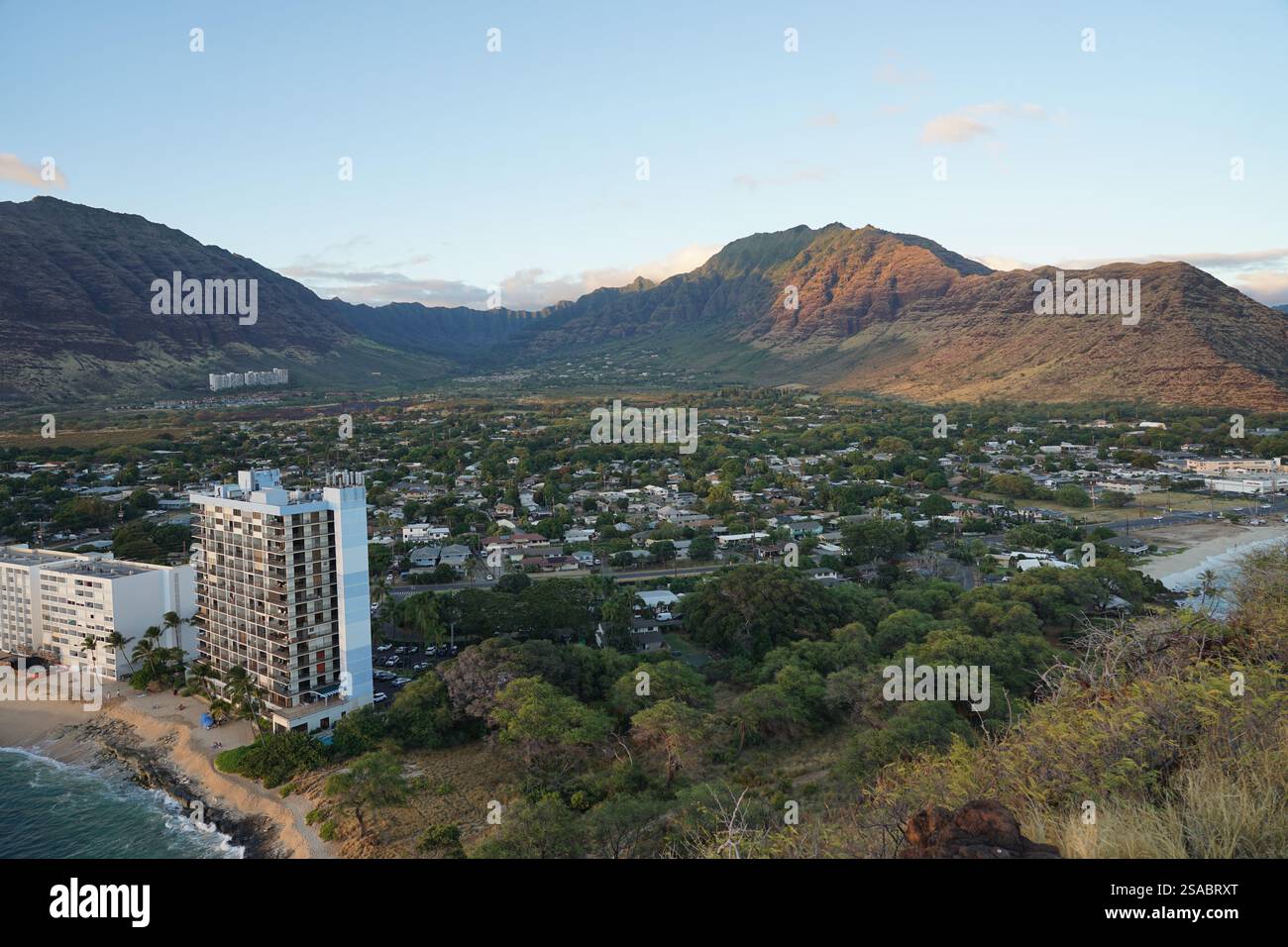 Aerial view of a coastal town with mountains and ocean, Oahu, Hawaii ...