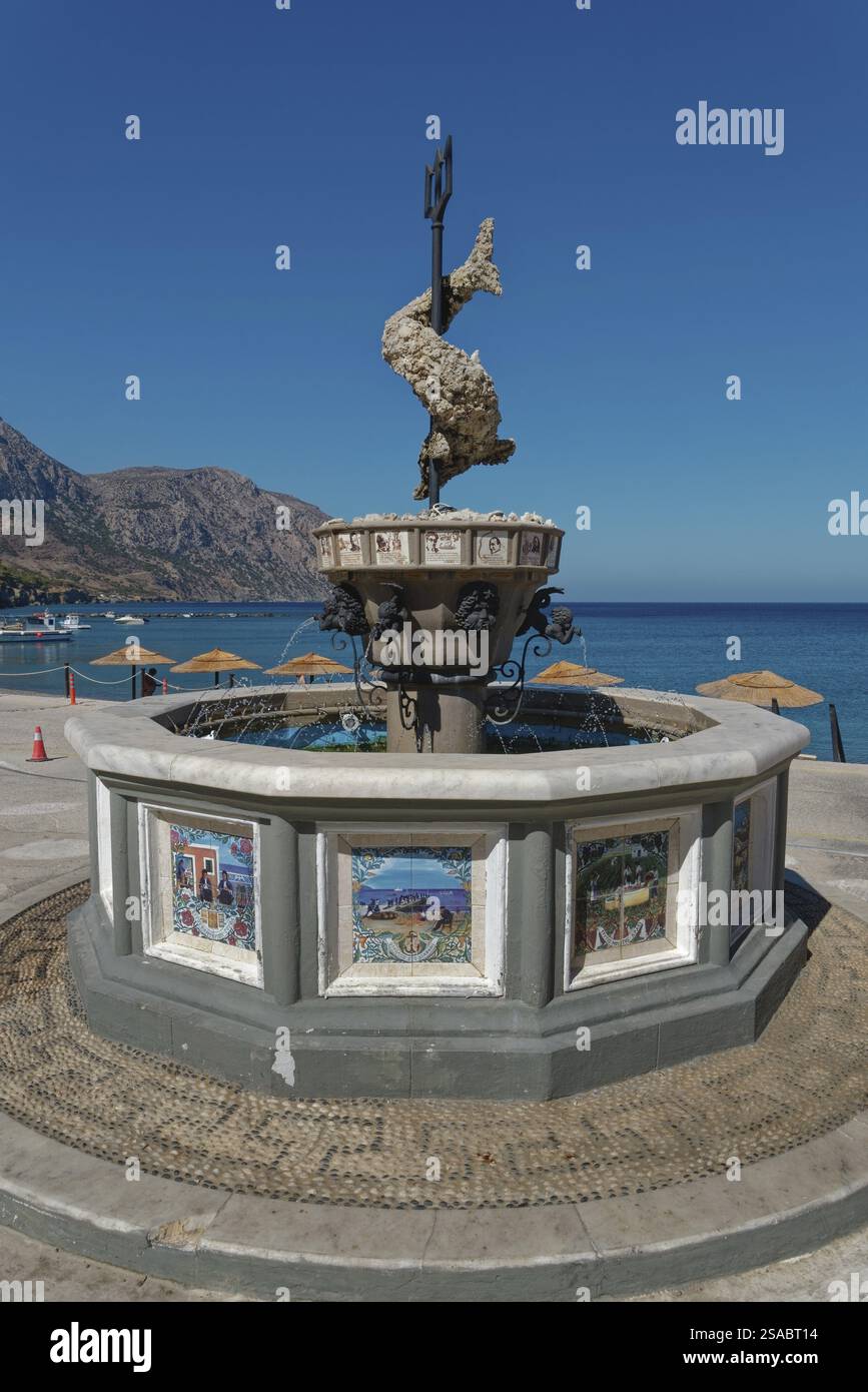 Decorative Neptune fountain OOlymbitissa with fish sculpture in front ...