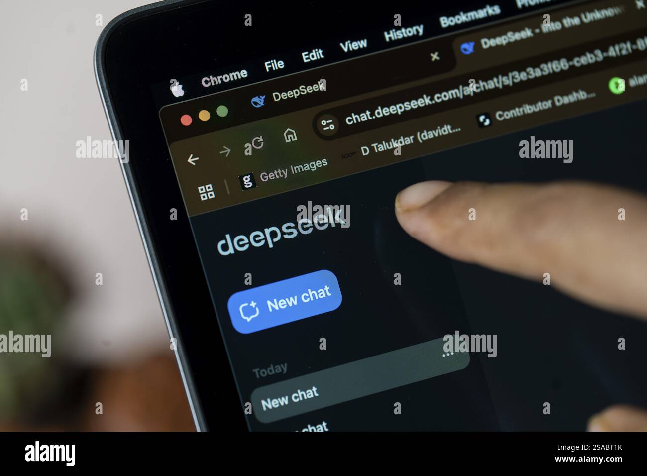 In this photo illustration, the DeepSeek app is displayed on a laptop ...