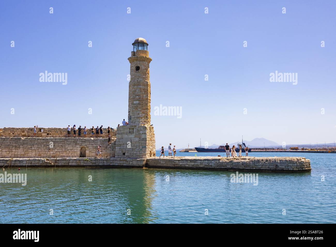 Lighthouse at the old Venetian harbour, Rethymno, Crete, Greece, Europe ...