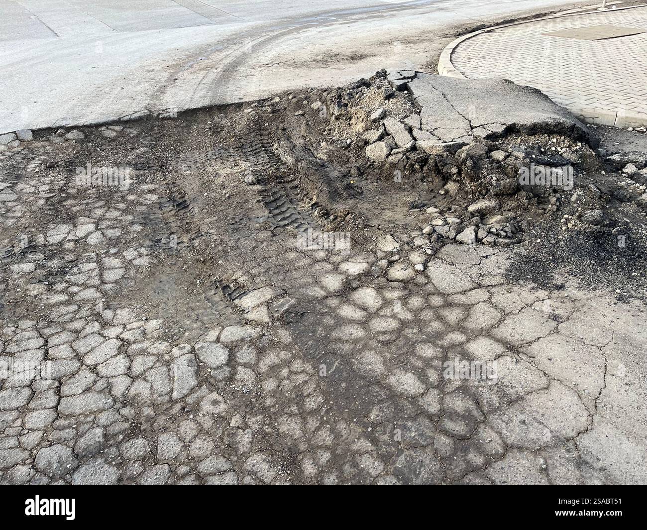 Road pithole hi-res stock photography and images - Alamy