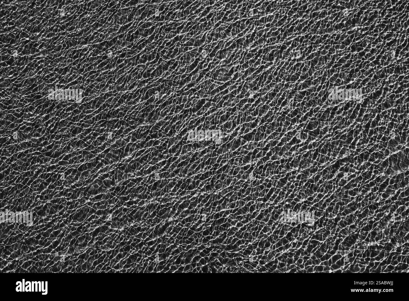 Monochrome, drone shot, water surface at the beach and bay of Balos ...