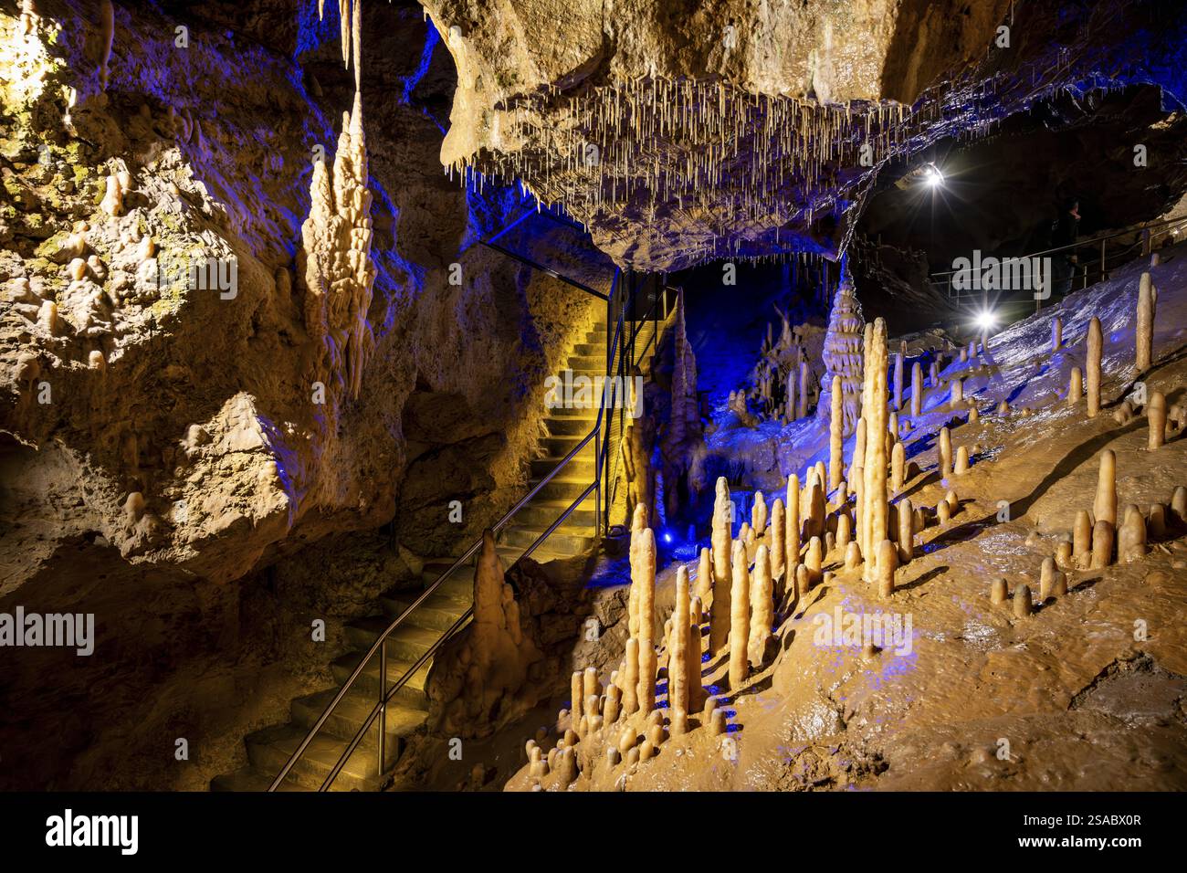 Stalagmites and stalactites in a cave, Devil's Cave Pottenstein ...