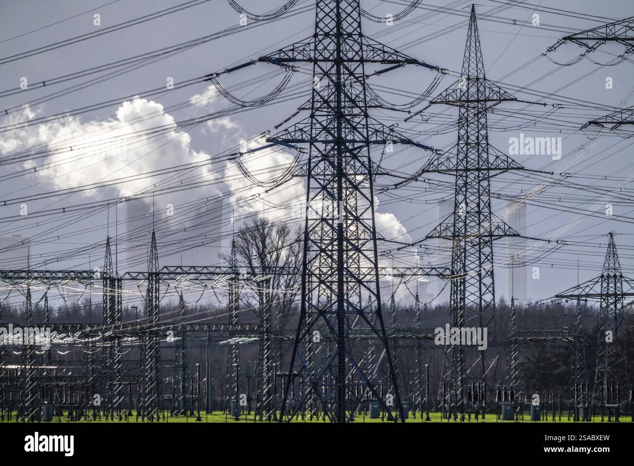 RWE Power lignite-fired power plant Niederaussem, high-voltage pylons ...