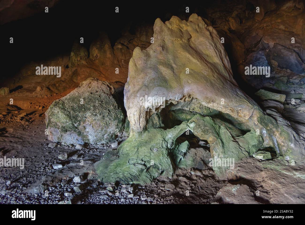 Larger rock formations in the dark Limniatis Cave, hike from Aperi to ...