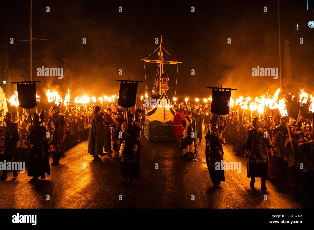 Lerwick, Scotland, 01.28.2025 Guizer Jarl Calum Grains leads with the ...