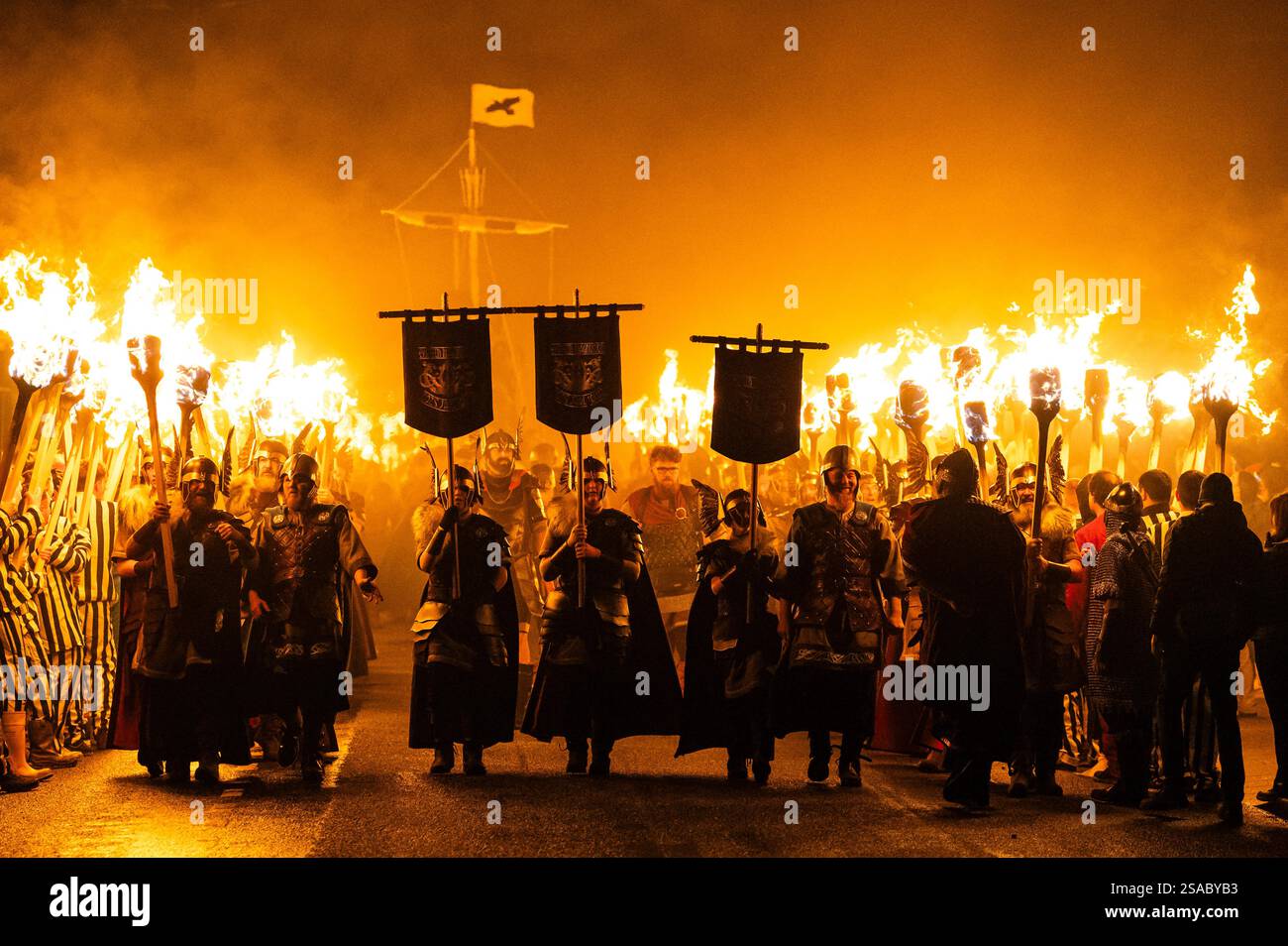 Lerwick, Scotland, 01.28.2025 Guizer Jarl Calum Grains leads with the ...