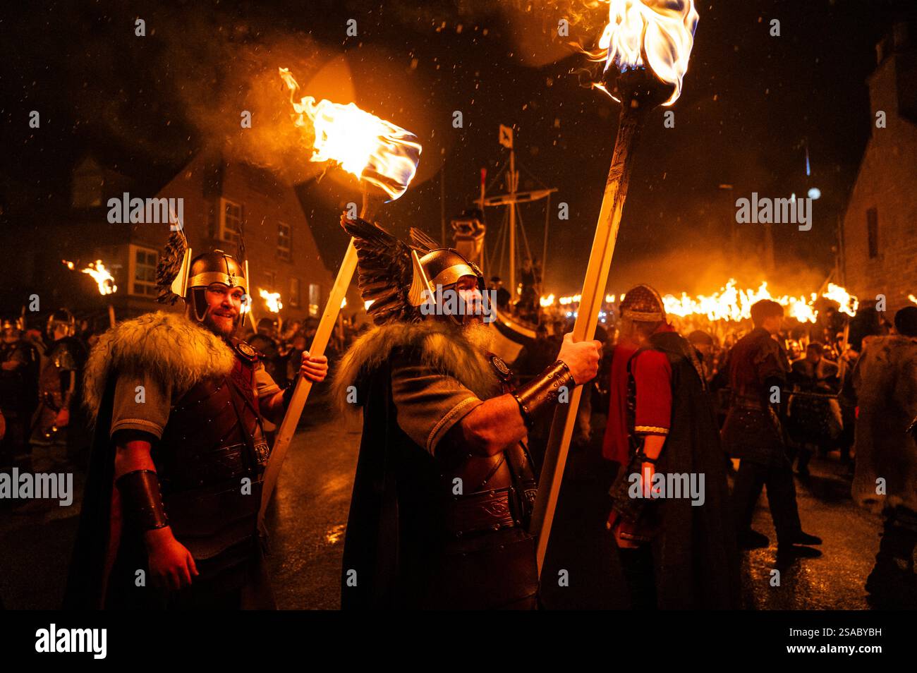 Lerwick, Scotland, 01.28.2025 Guizer Jarl Calum Grains leads with the galley and his guizers ...