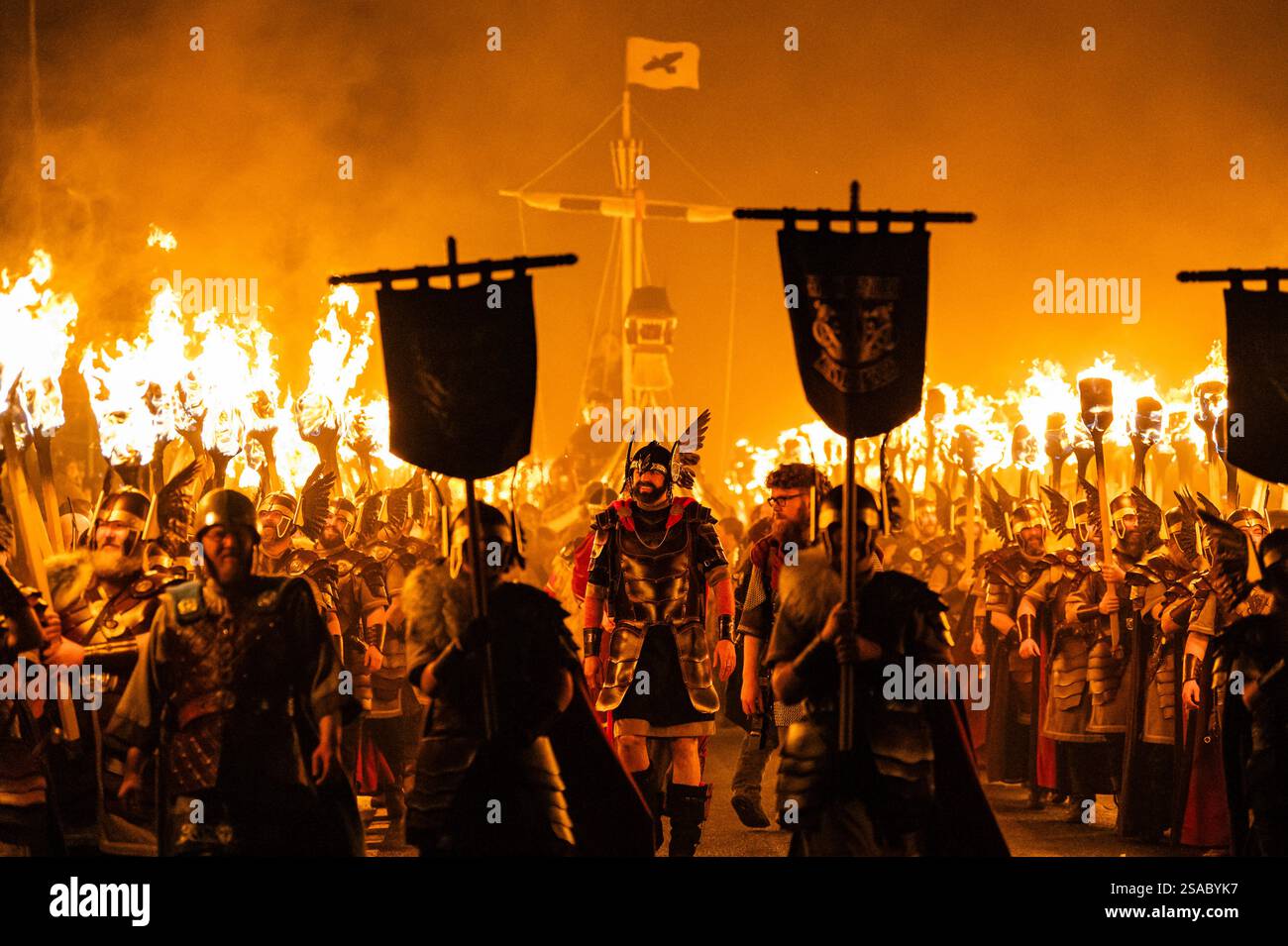 Lerwick, Scotland, 01.28.2025 Guizer Jarl Calum Grains leads with the ...