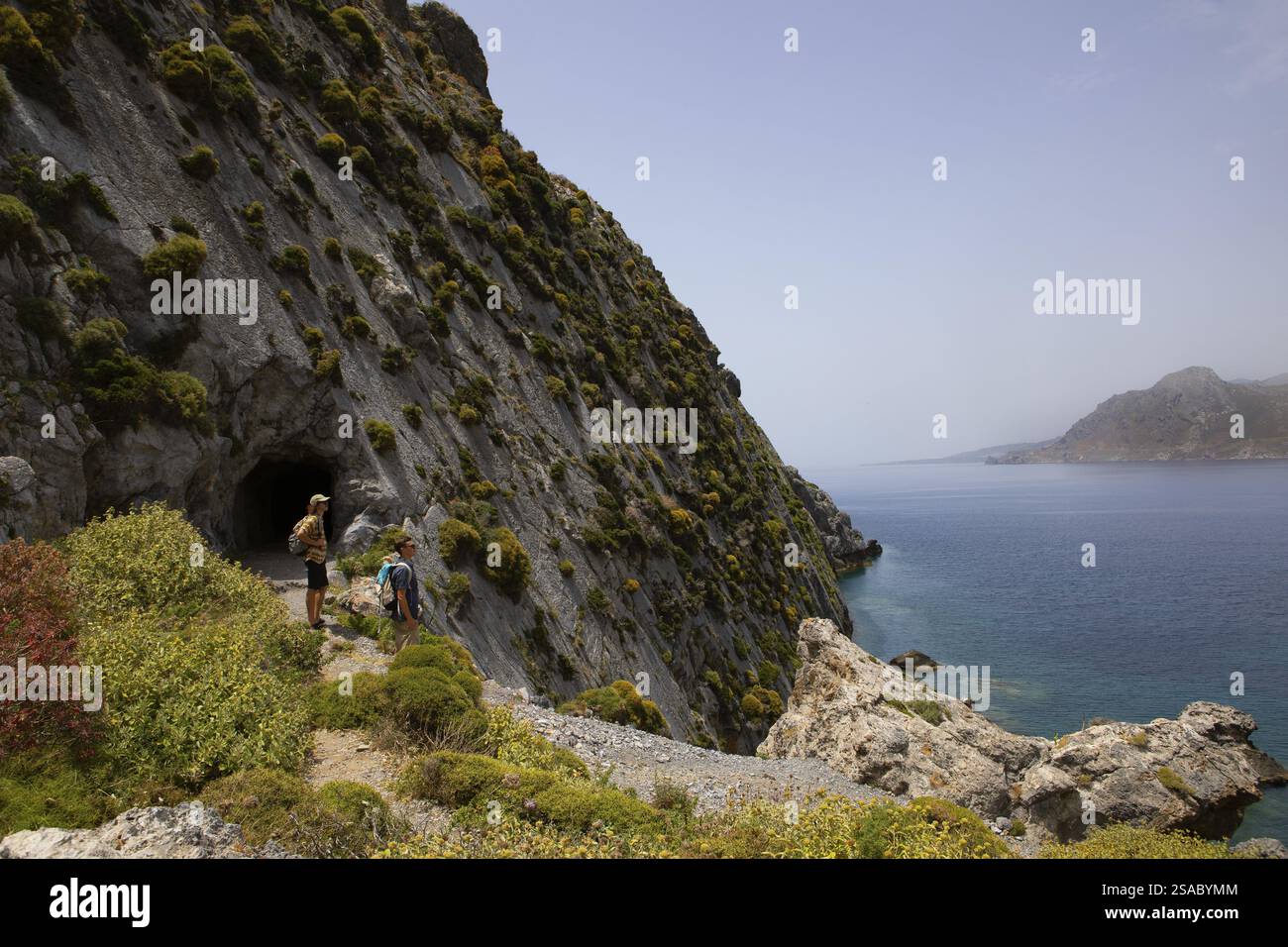 Hikers on the Sarella peninsula near Plakias, south coast, Crete ...
