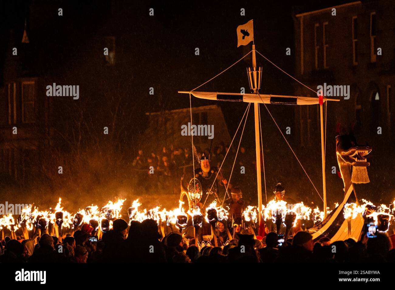Lerwick, Scotland, 01.28.2025 Guizer Jarl Calum Grains leads with the galley and his guizers ...
