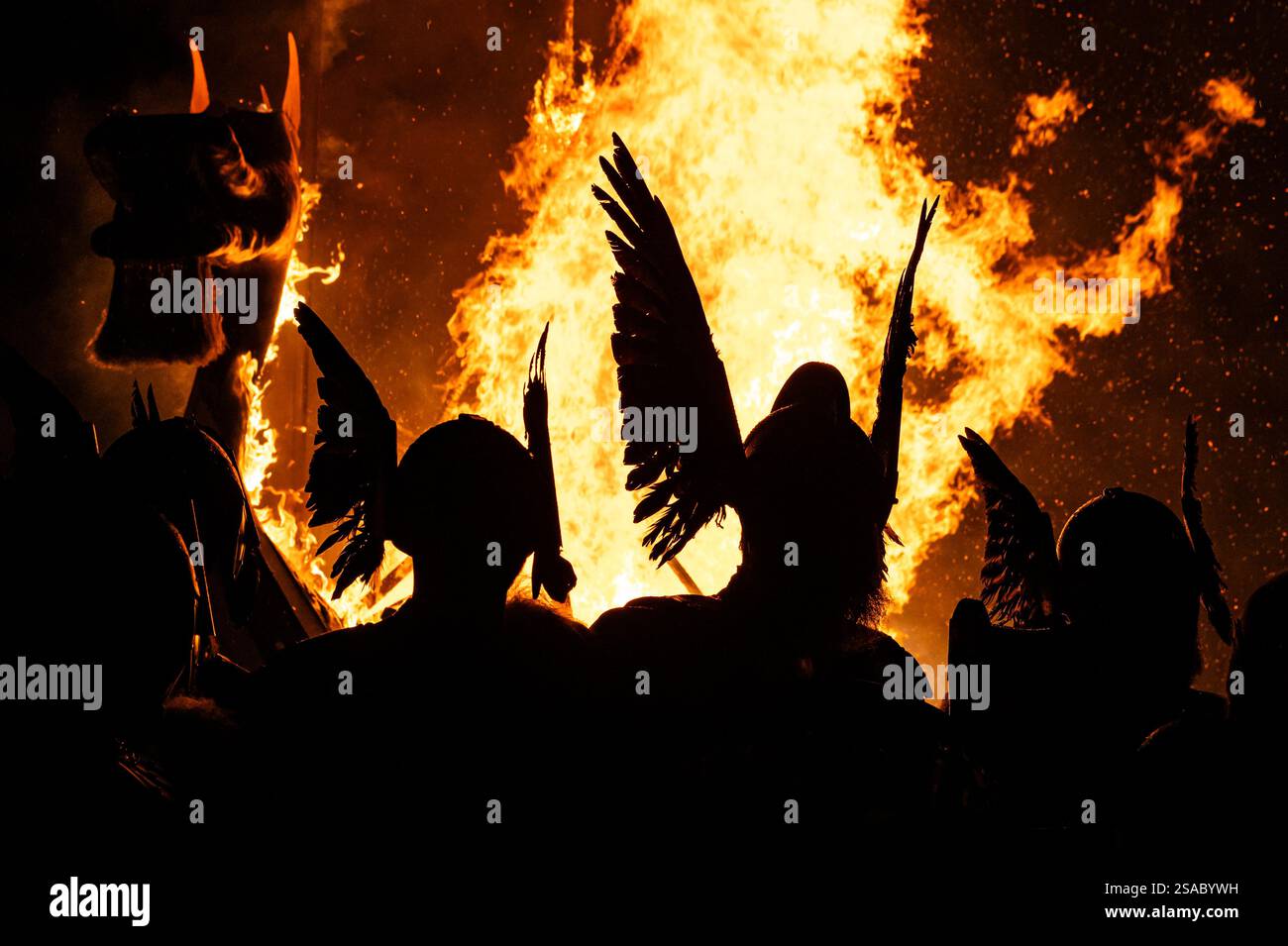 Lerwick, Scotland, 01.28.2025 Guizer Jarl Calum Grains leads with the galley and his guizers ...