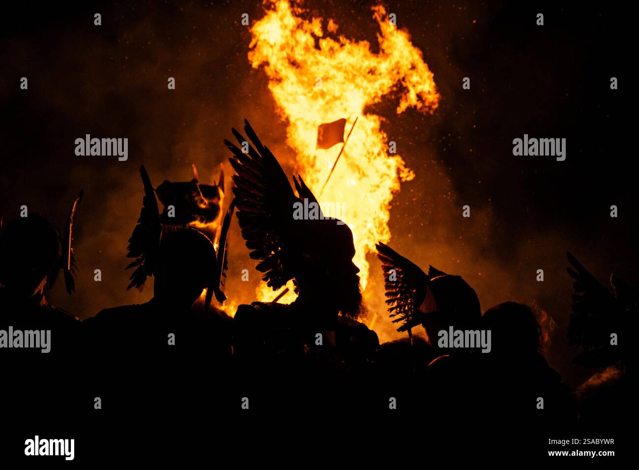 Lerwick, Scotland, 01.28.2025 Guizer Jarl Calum Grains leads with the ...