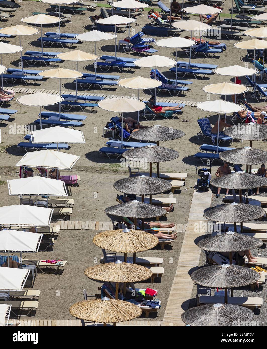 Parasols on Agia Galini beach, Agia Galini, south coast, Crete, Greece ...