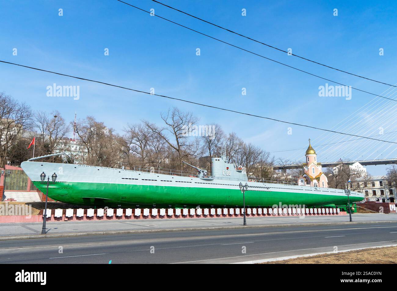 View of the submarine museum and the cables of the Golden cable-stayed ...