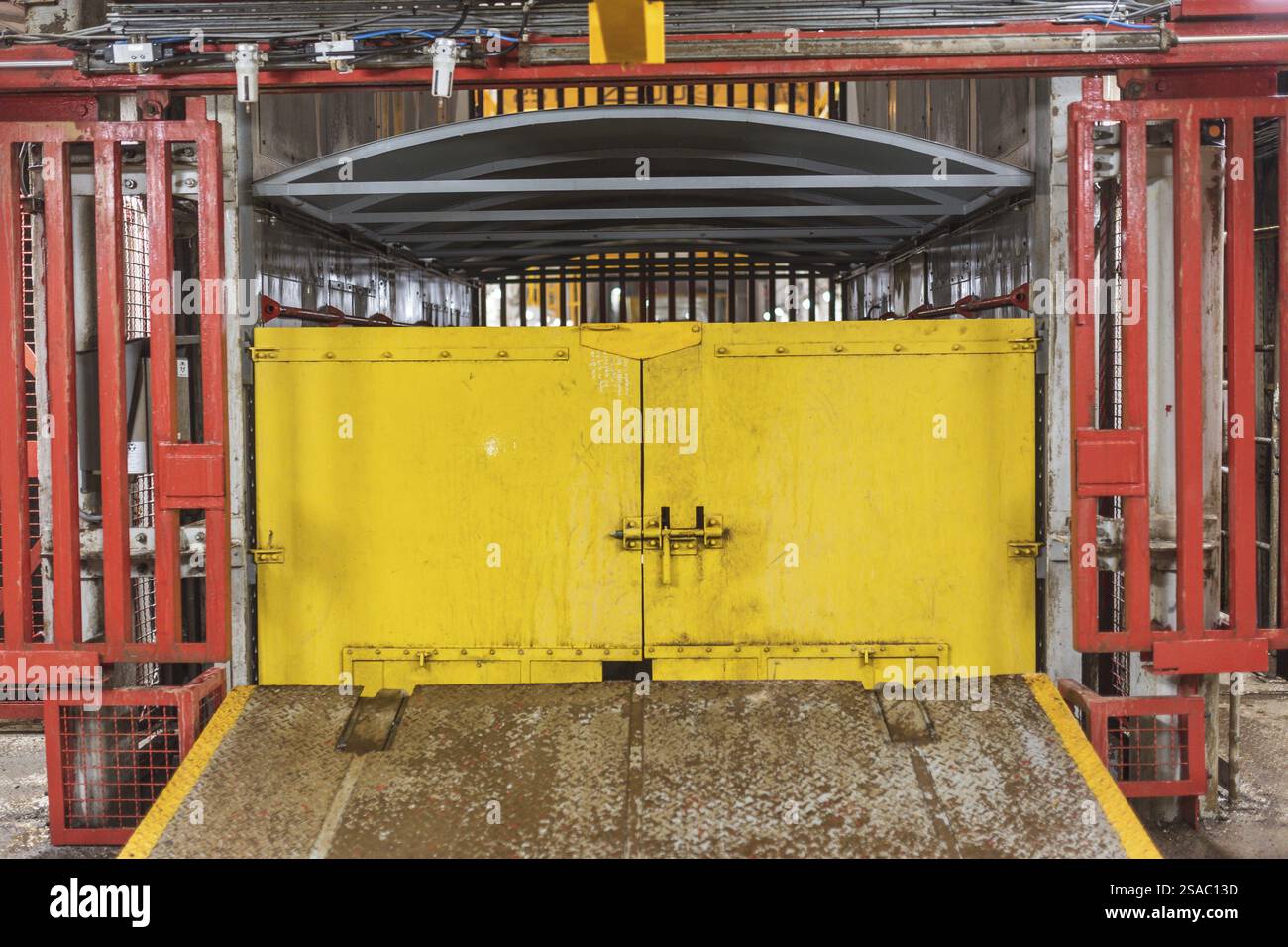 Gate to the shaft and exit cage in the mine Stock Photo - Alamy