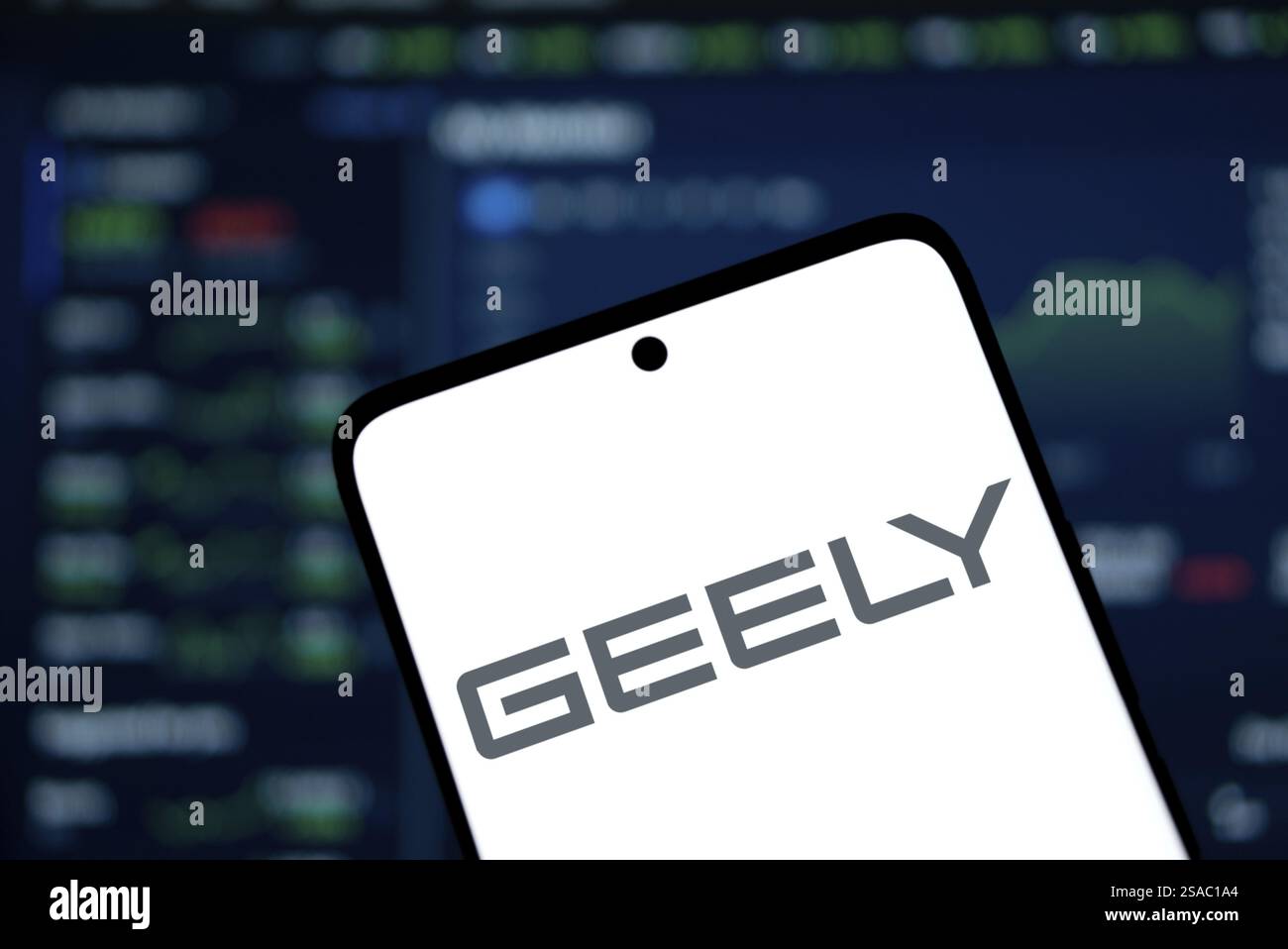 Geely logo is displayed on smartphone. Zhejiang Geely Holding Group Co ...