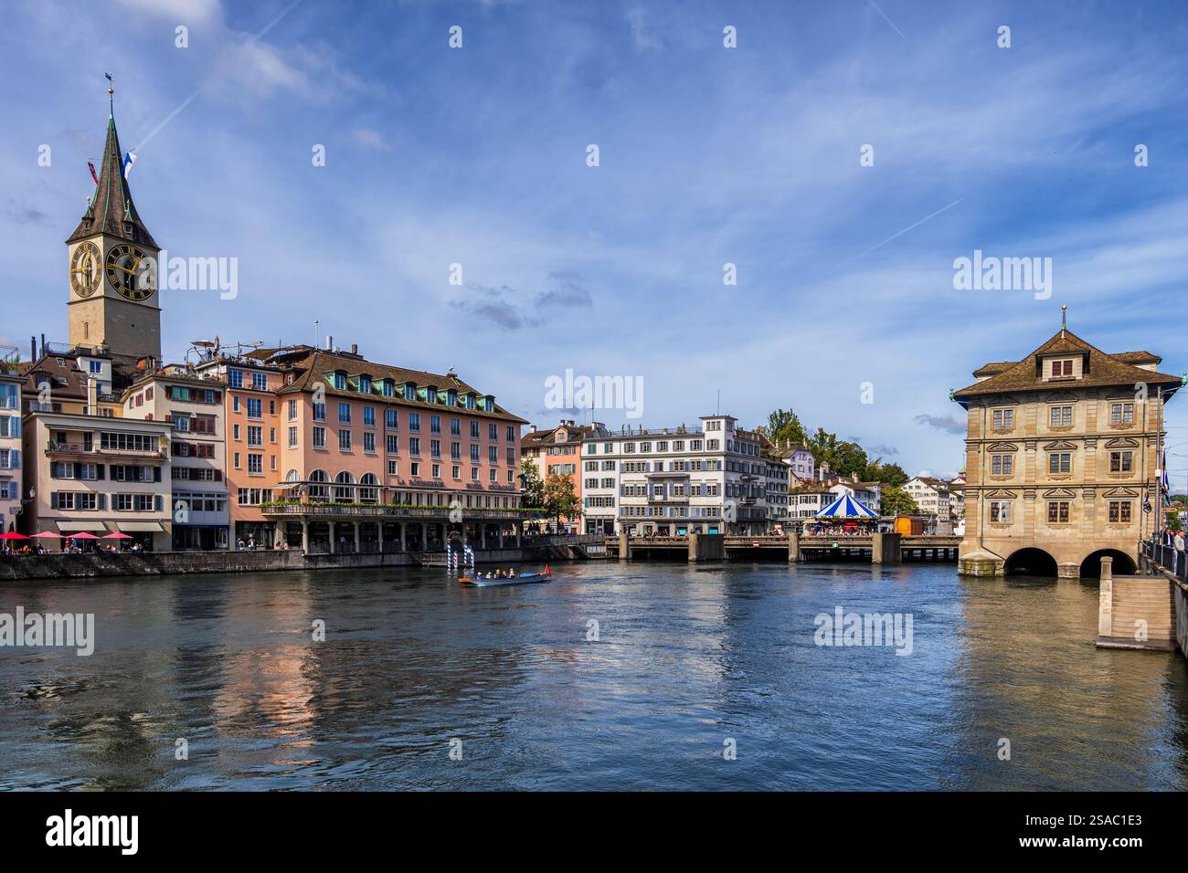 Zurich city skyline with Rathausbrucke bridge across River Limmat in ...
