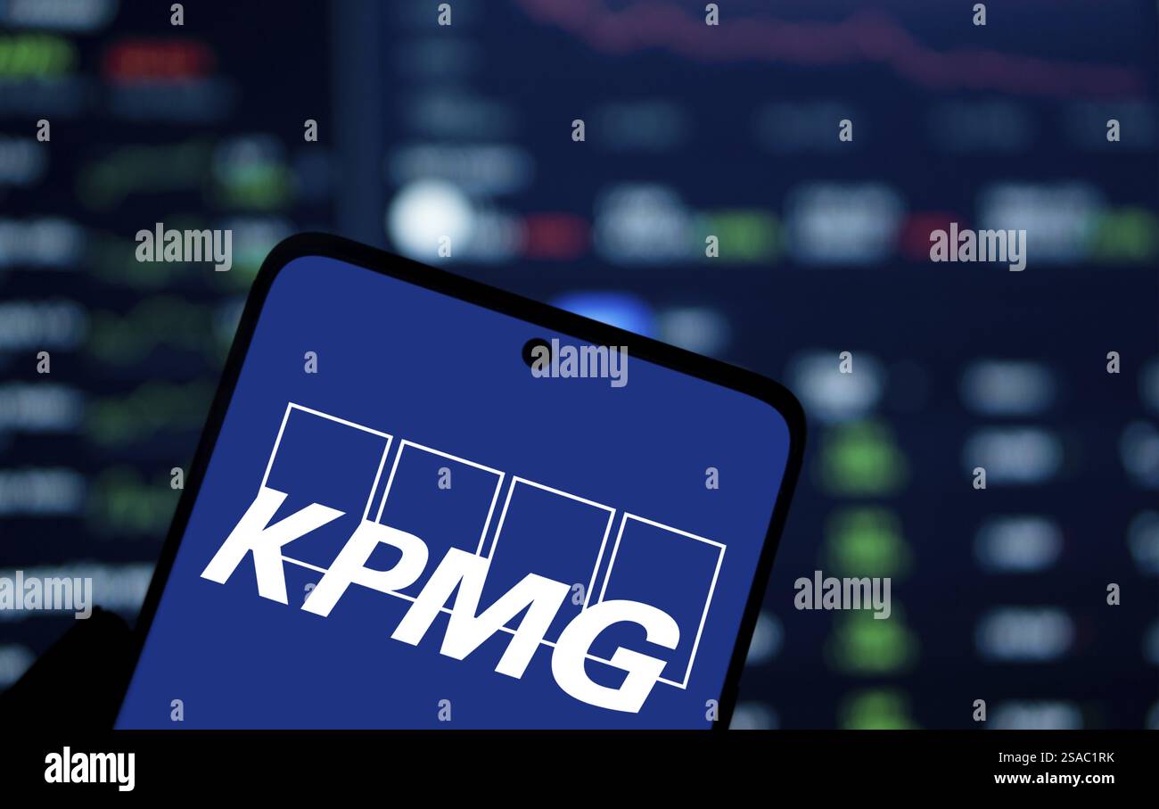 kpmg logo is displayed on smartphone. KPMG International Limited is a ...