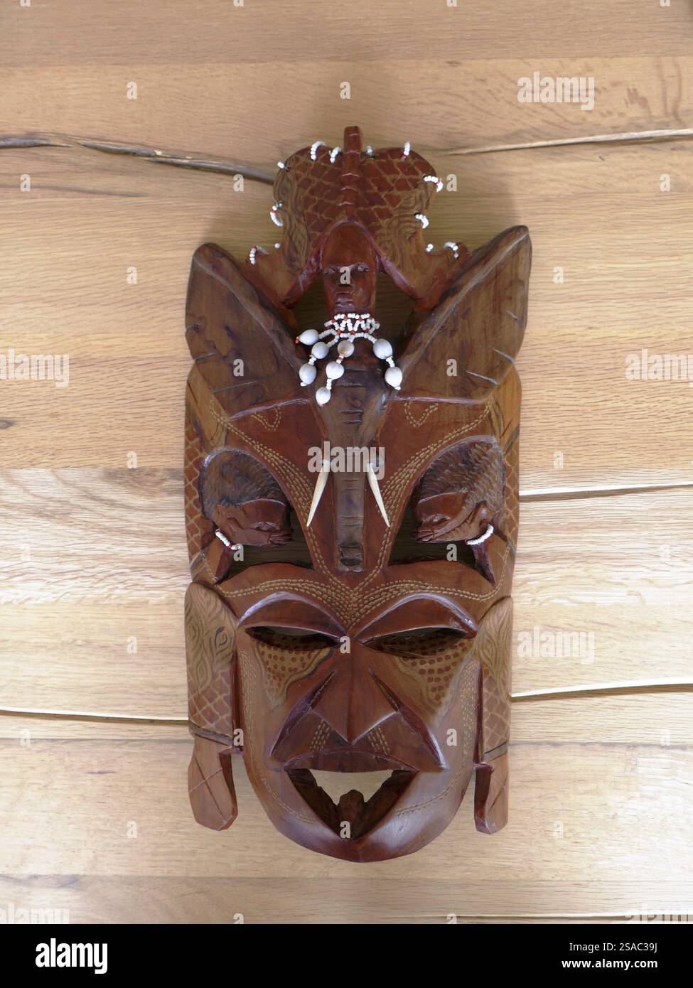 Hand carved wooden masks hi-res stock photography and images - Alamy